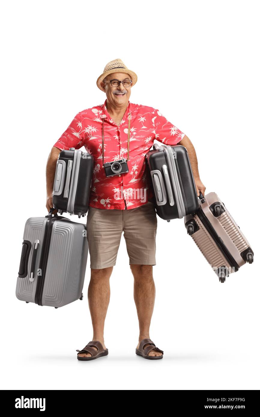 Mature male tourist carrying many suitcases isolated on white ...