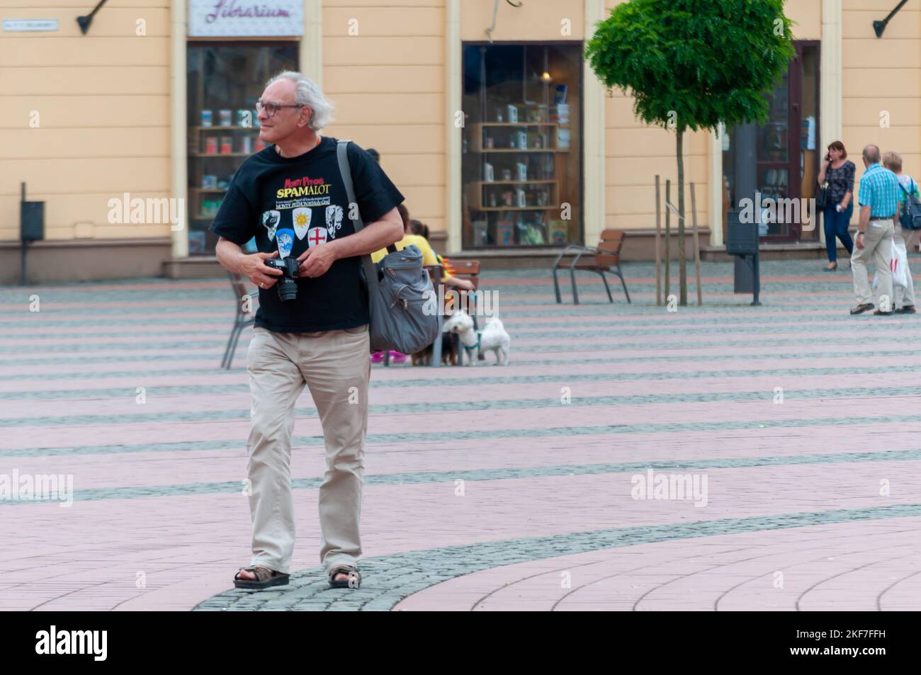 Timisoara, Romania - May 23, 2017: Man with a camera walking on the ...