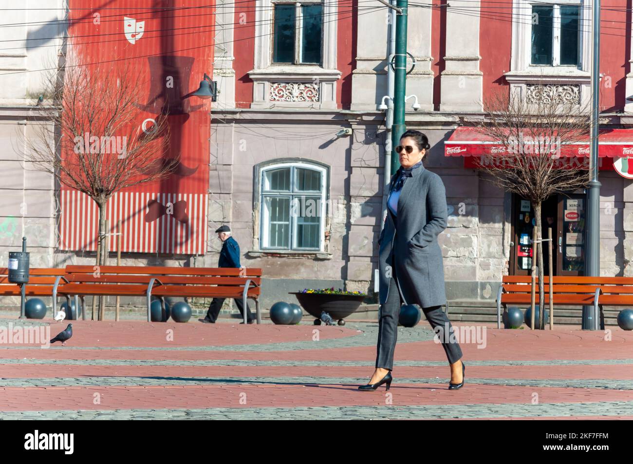 Timisoara, Romania - March 15, 2018: Woman walking on the street. Real ...