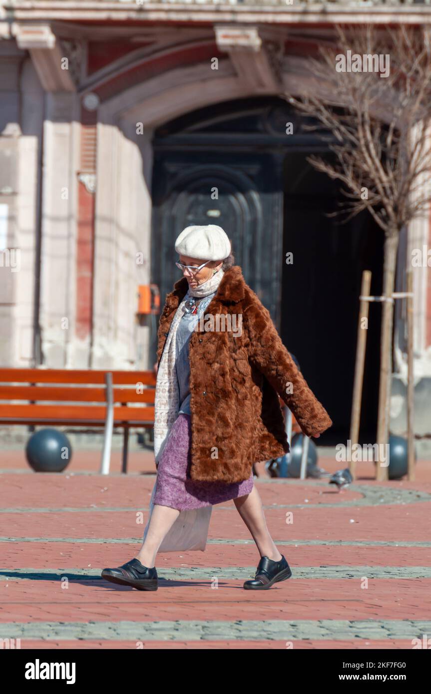 Timisoara, Romania - March 15, 2018: Woman walking on the street. Real ...