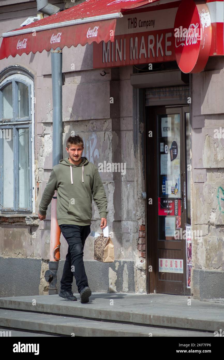 Timisoara, Romania - April 17, 2021: Man walking on the street. Real ...