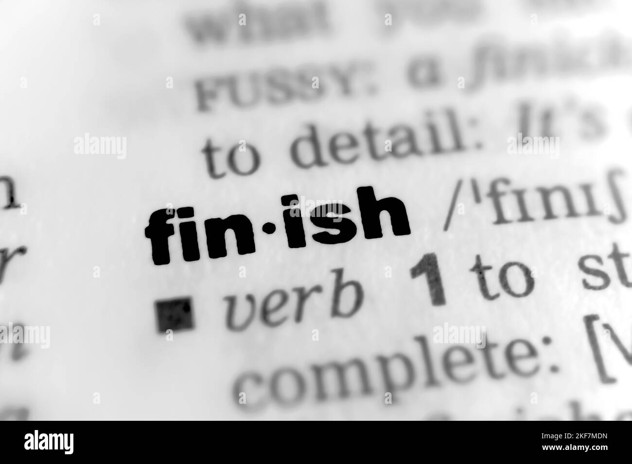 A closeup shot from the book of the word 'finish' divided by syllables ...