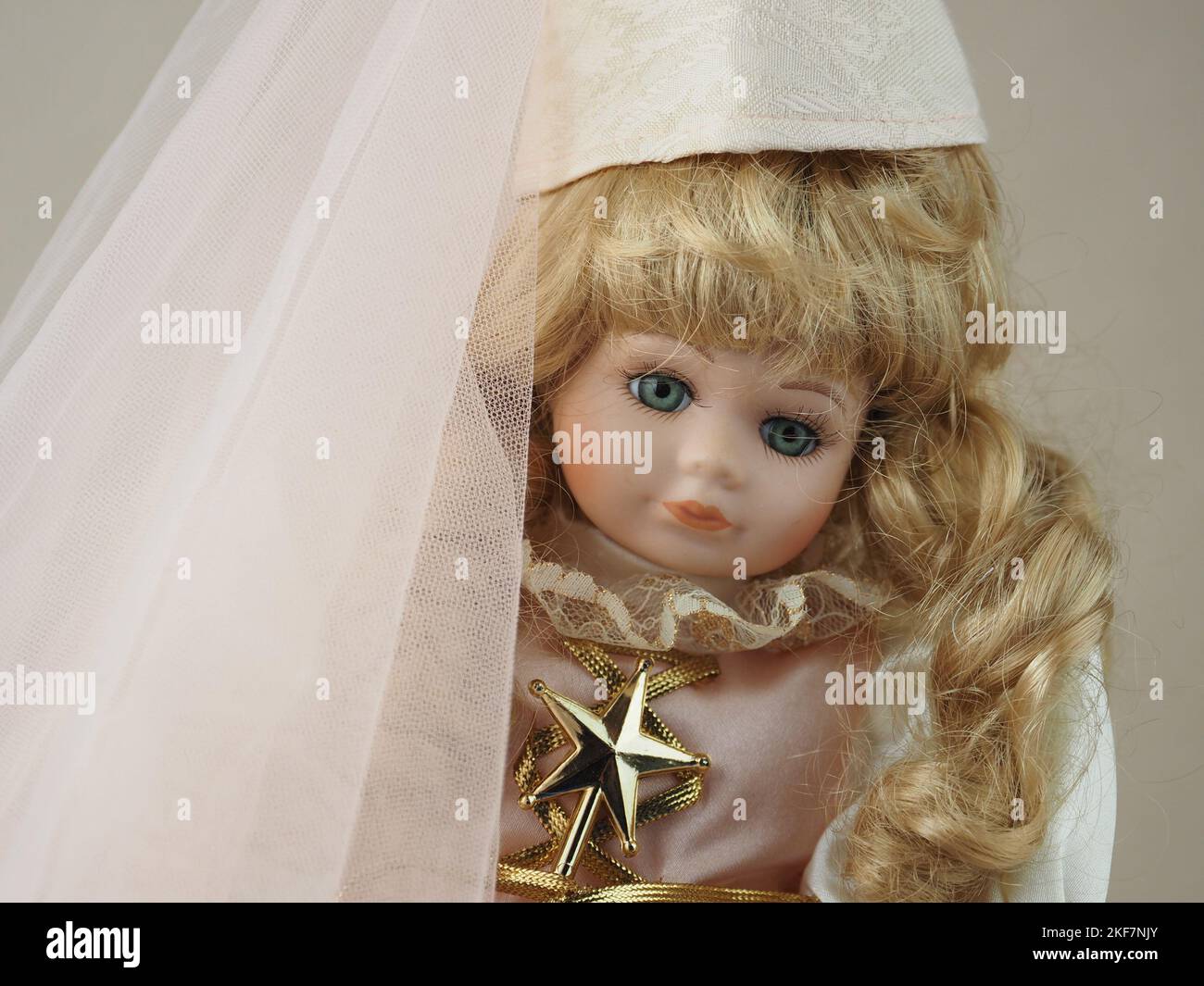 Vintage porcelain doll fairy with a magic wand Stock Photo - Alamy