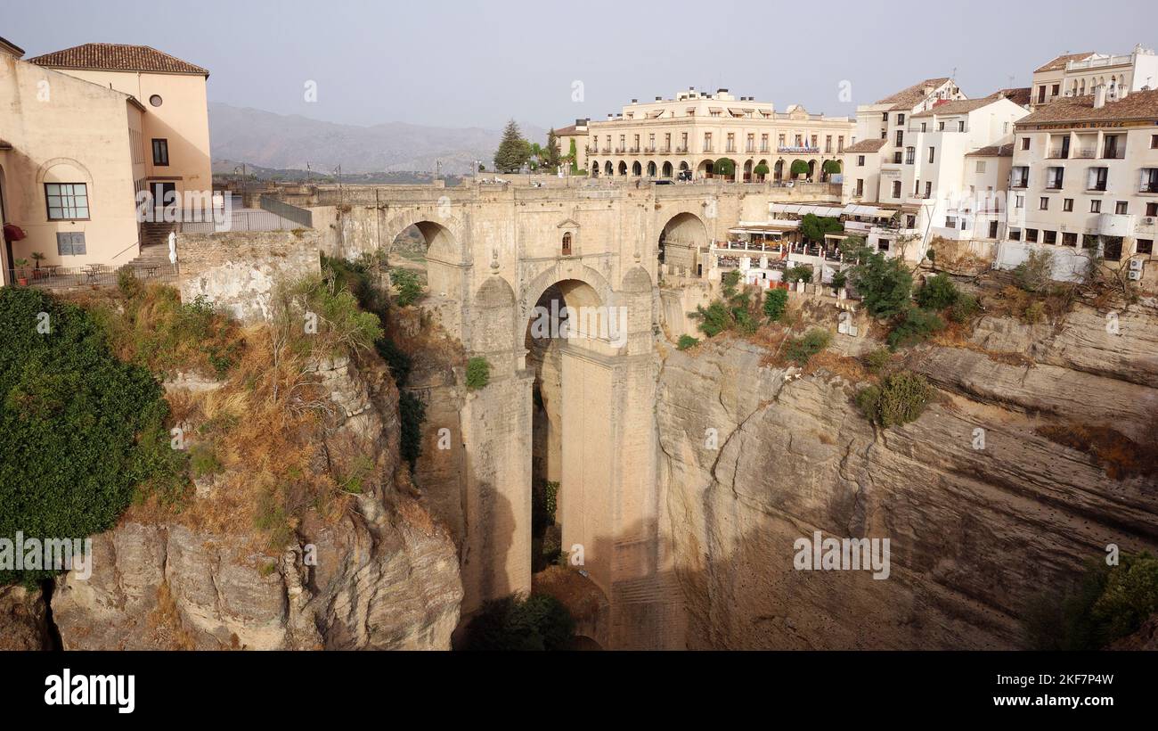 Aerial drone view of New Bridge in Ronda. White villages in the ...
