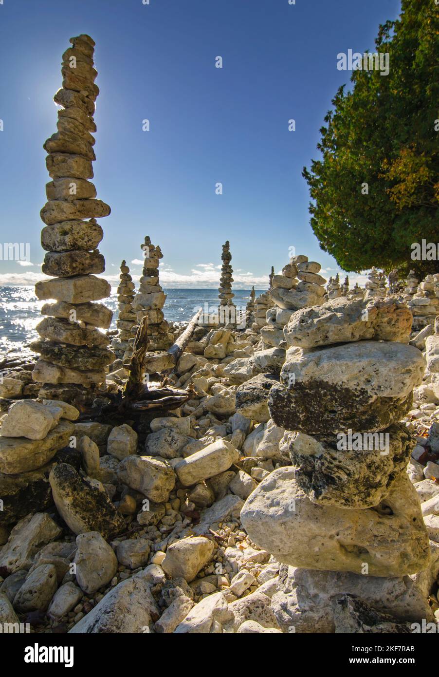 With lower water levels in the Great Lakes tourists built rock cairns ...