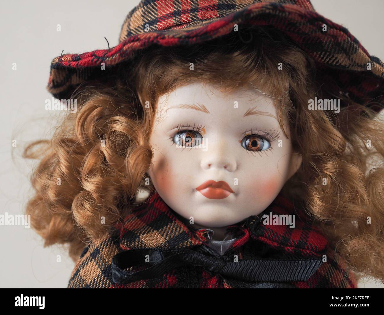 Vintage porcelain doll girl with brown eyes with red flowing curly hair ...