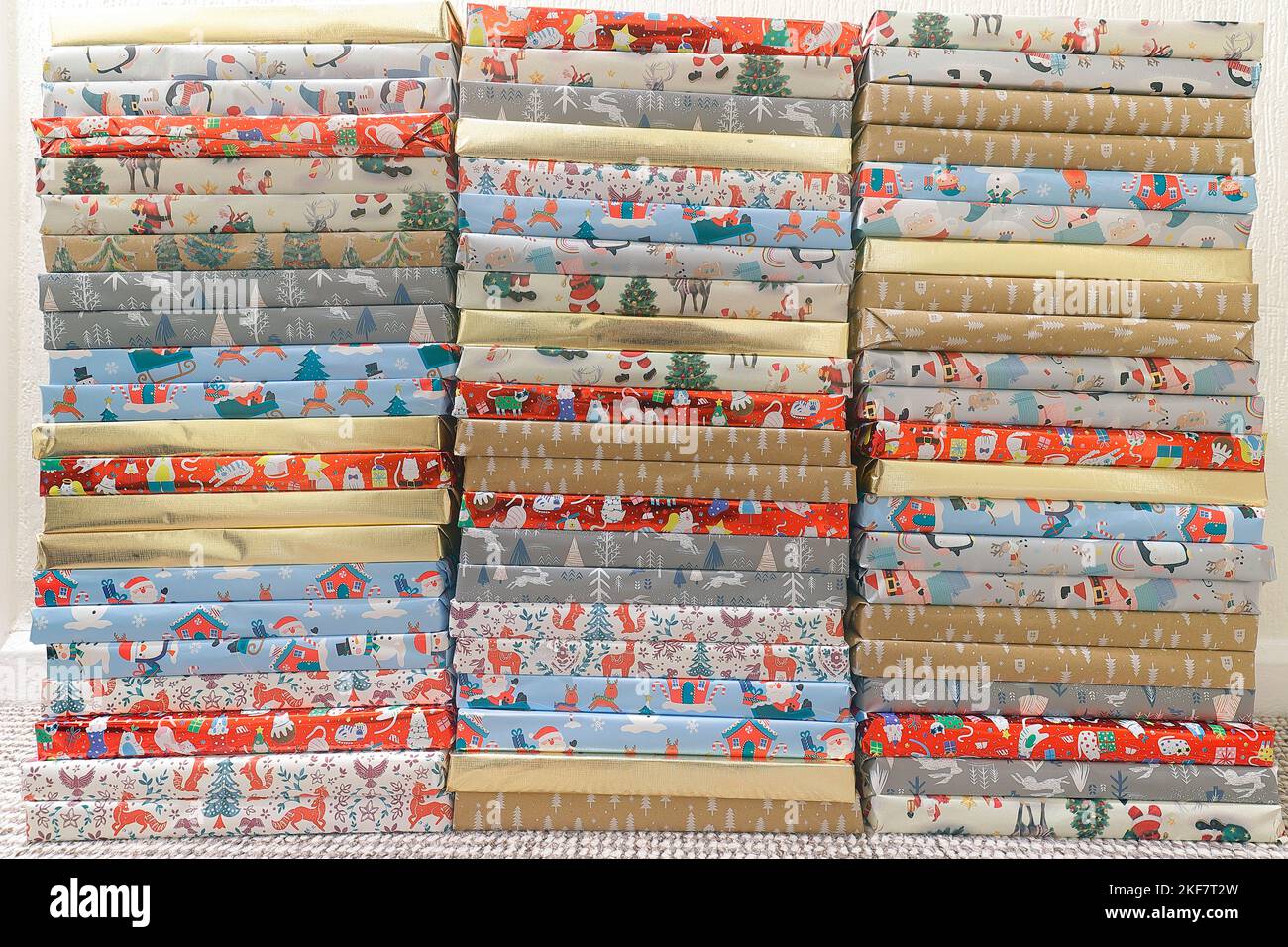 Rows of stacked christmas presents hi-res stock photography and images ...