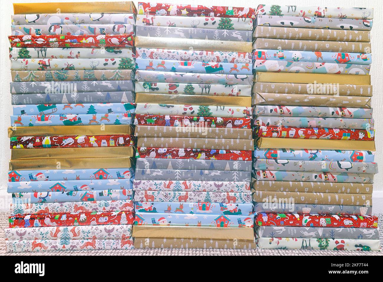 Rows of stacked christmas presents hi-res stock photography and images ...
