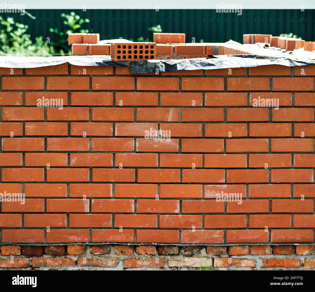 underconstruction brick wall of the house Stock Photo - Alamy