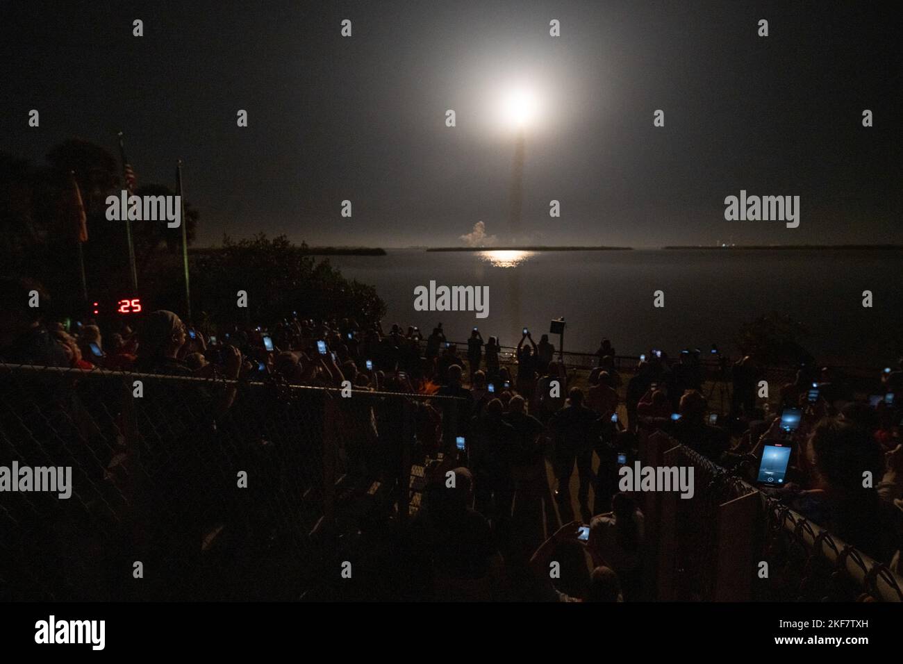 Cape Canaveral, Florida, USA. 16th Nov, 2022. Guests at the Banana Creek viewing site watch the ...