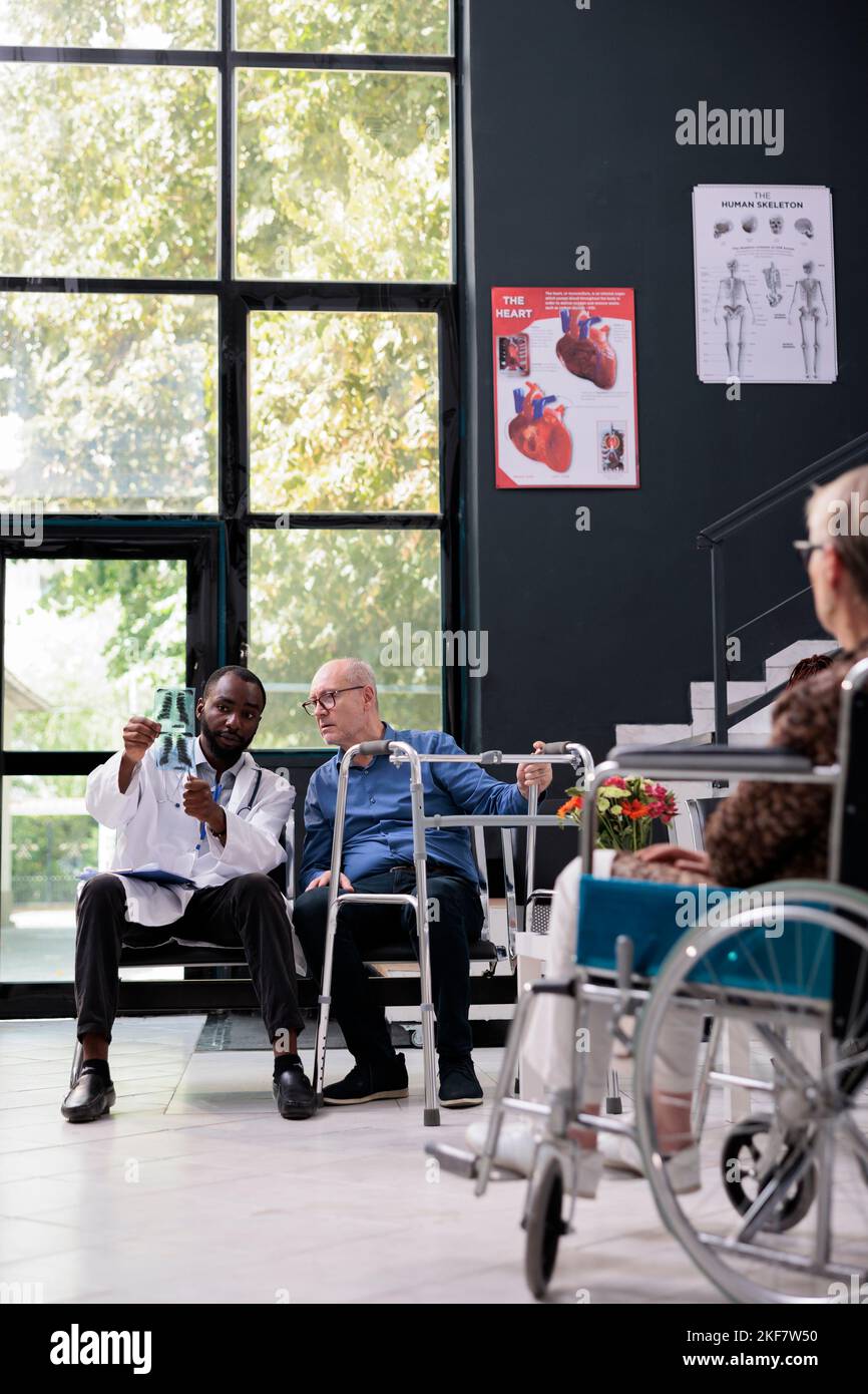 Medic analyzing radiography in hi-res stock photography and images - Alamy