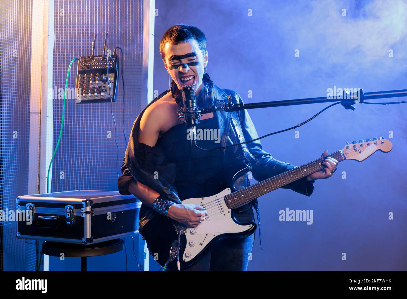 Heavy metal artist screaming loud and singing alternative rock music ...