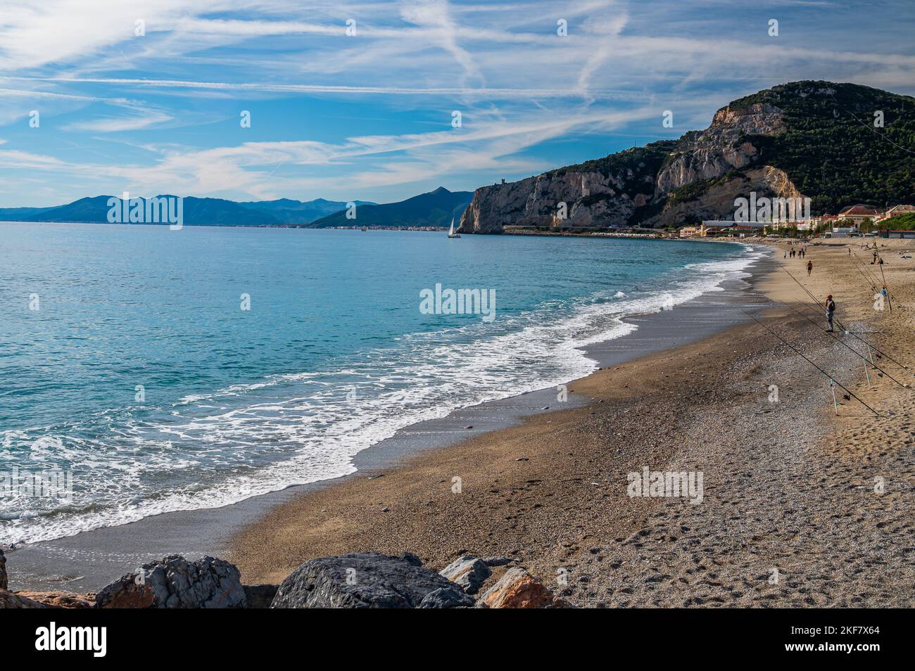 Sandy beach of the village of Finale Ligure on the Italian Riviera ...