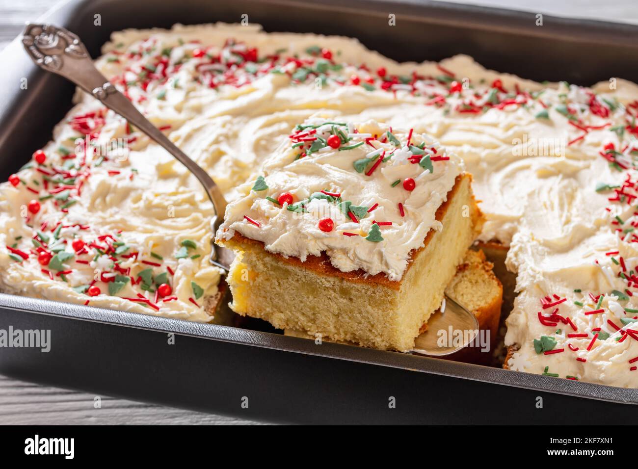 slice of christmas vanilla sheet cake with whipped buttercream frosting ...