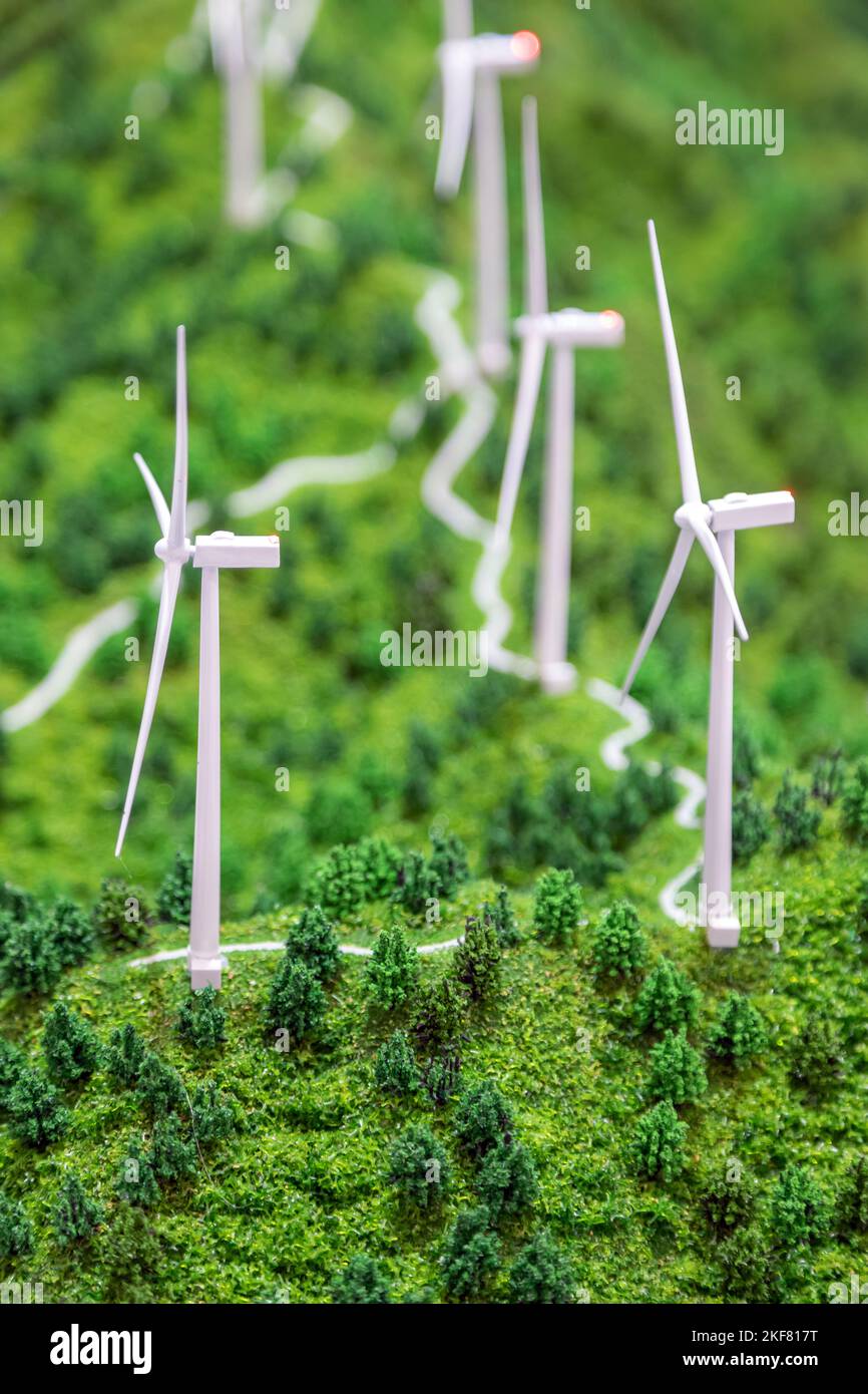 small plastic wind turbines in a model landscape Stock Photo - Alamy