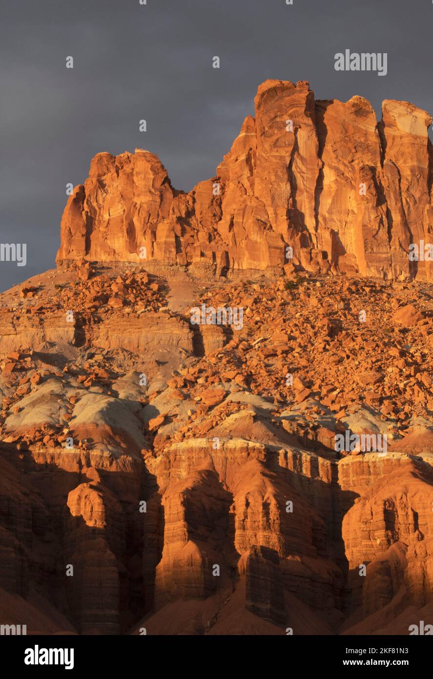 Sunset light on the Fluted Wall, rugged cliffs of Capitol Reef National ...