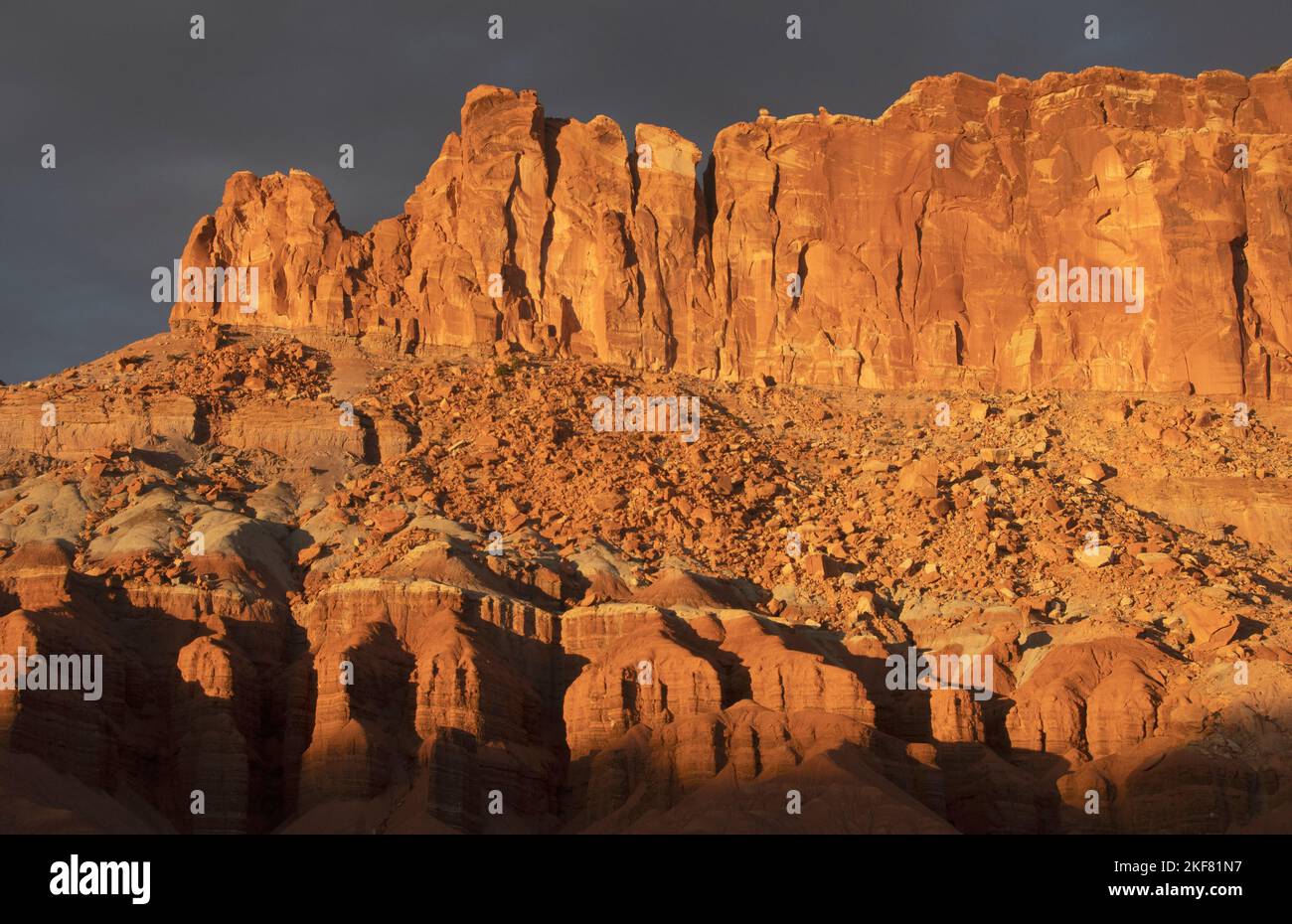Sunset light on the Fluted Wall, rugged cliffs of Capitol Reef National ...