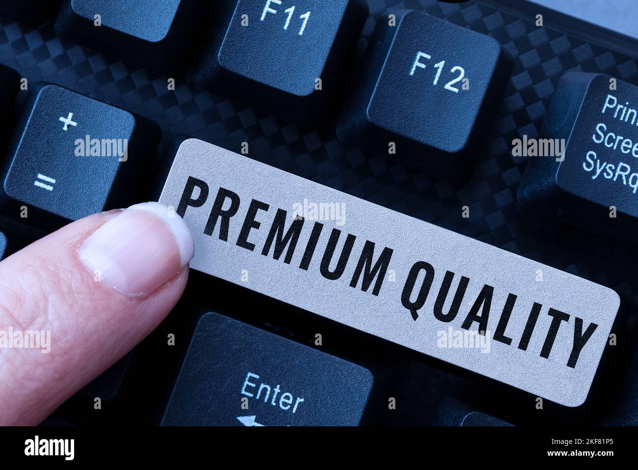 Sign displaying Premium Quality. Word Written on a brand that reaches ...