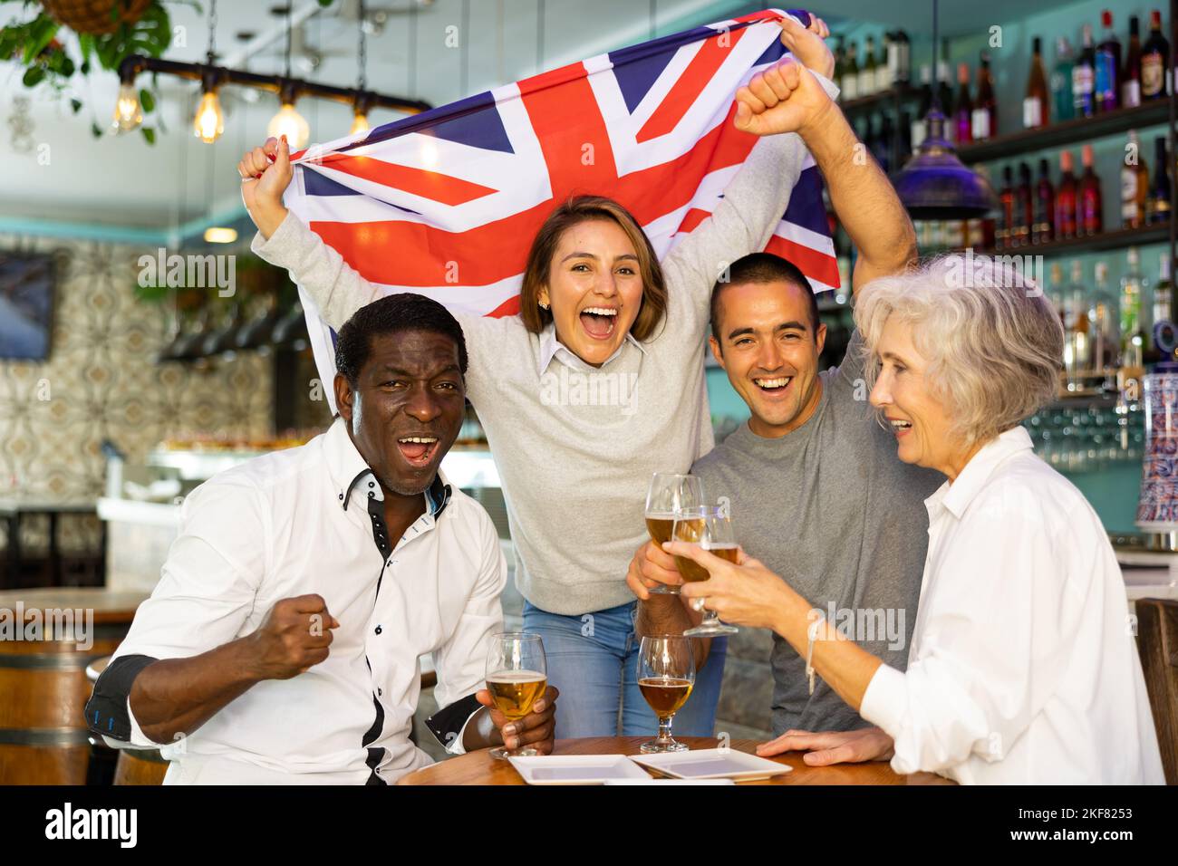 Colombian friends celebrating national flag hi-res stock photography ...