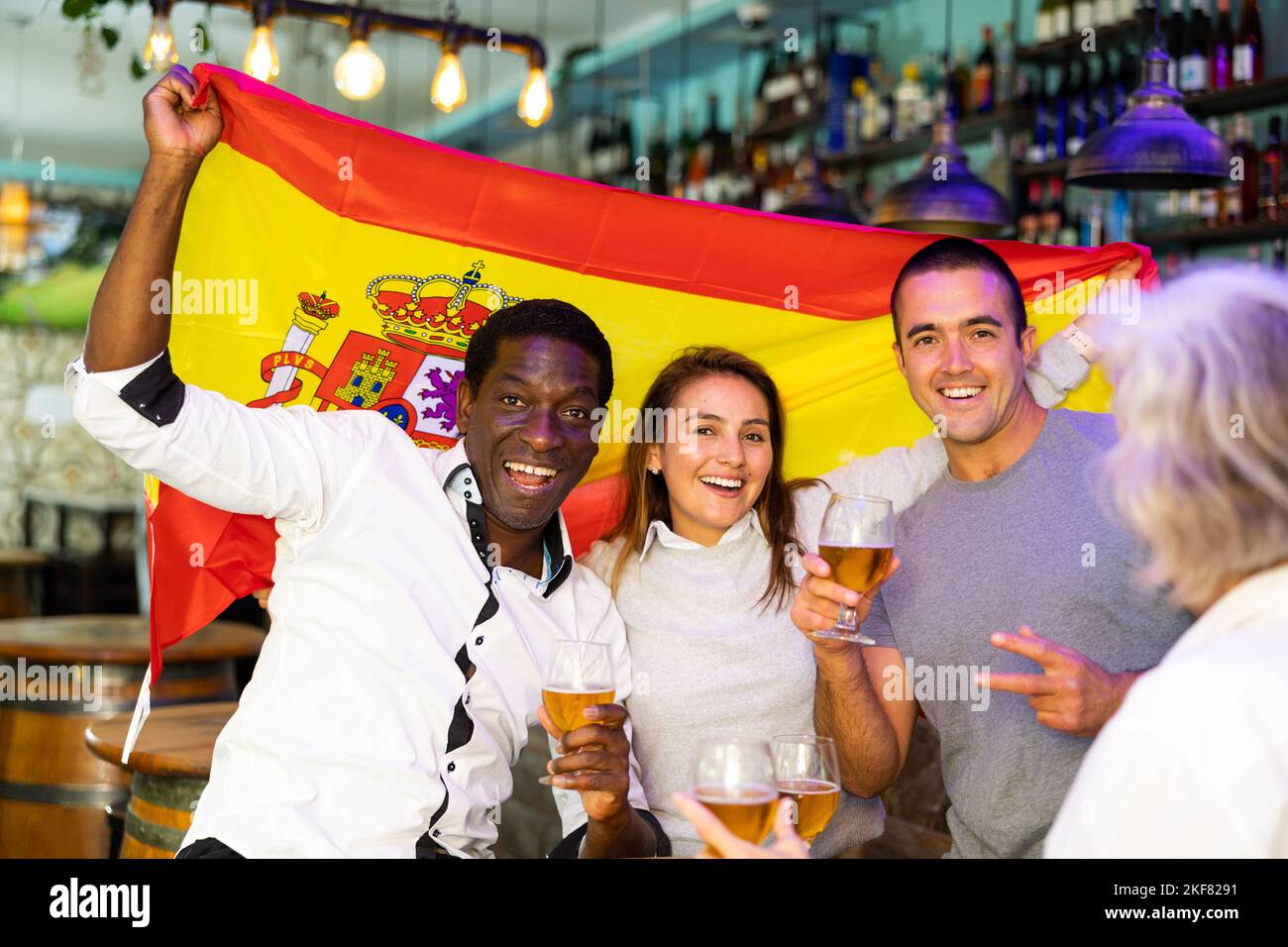 Happy diverse group celebrating Spain Stock Photo - Alamy