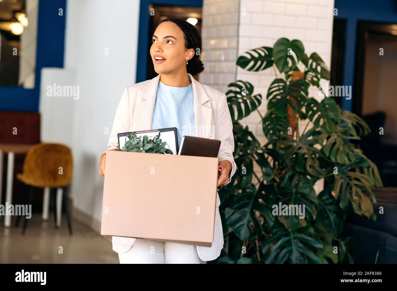 Excited successful motivated brazilian or hispanic woman, comes into ...