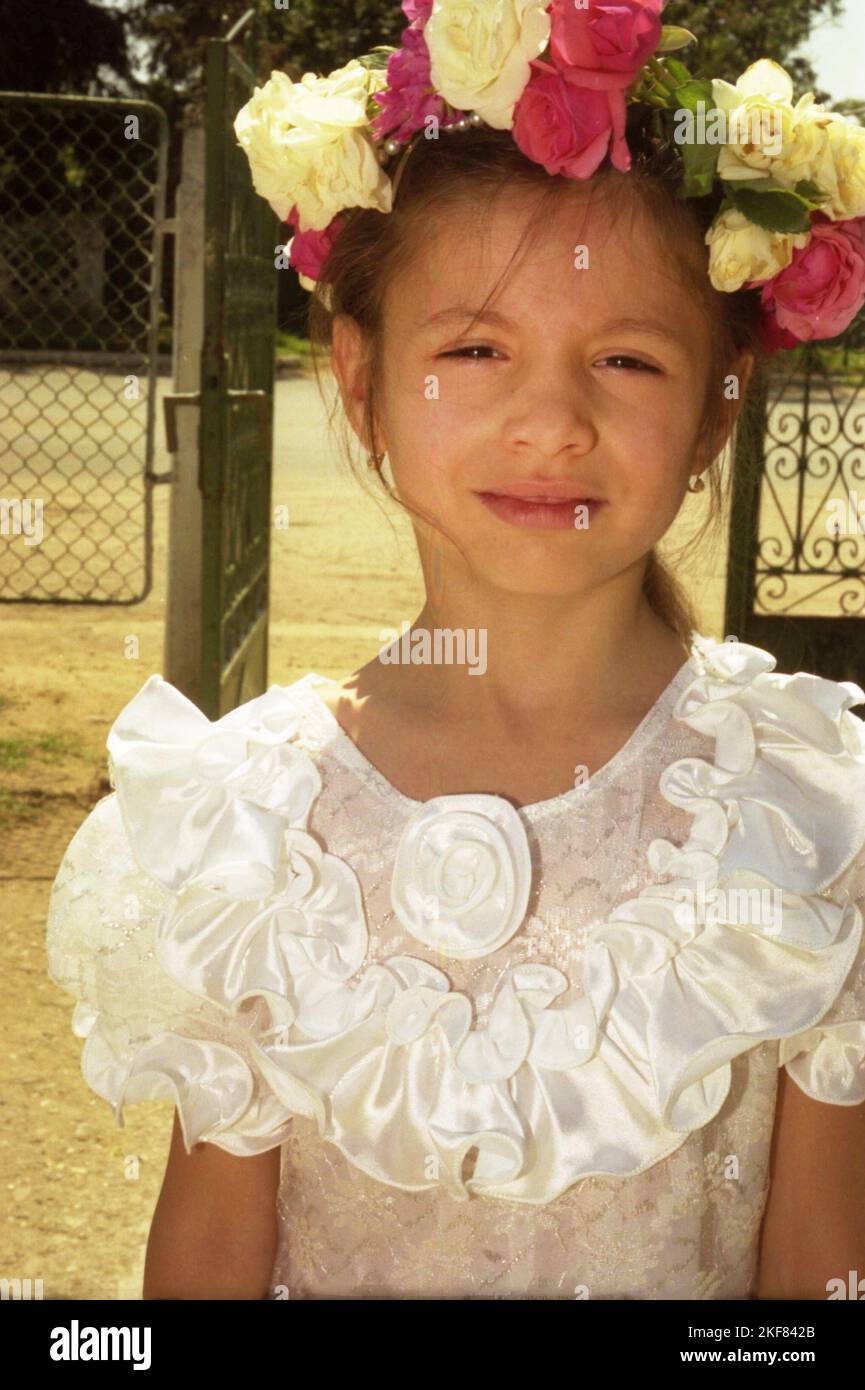 Ilfov County, Romania, approx. 2003. An elementary school girl wearing ...