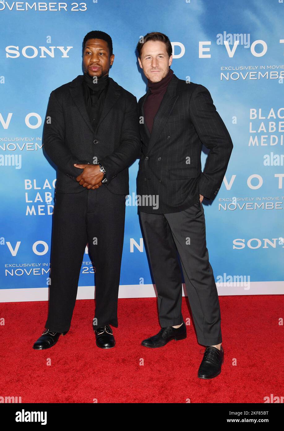 LOS ANGELES, CALIFORNIA - NOVEMBER 15: (L-R) Jonathan Majors and Sam ...