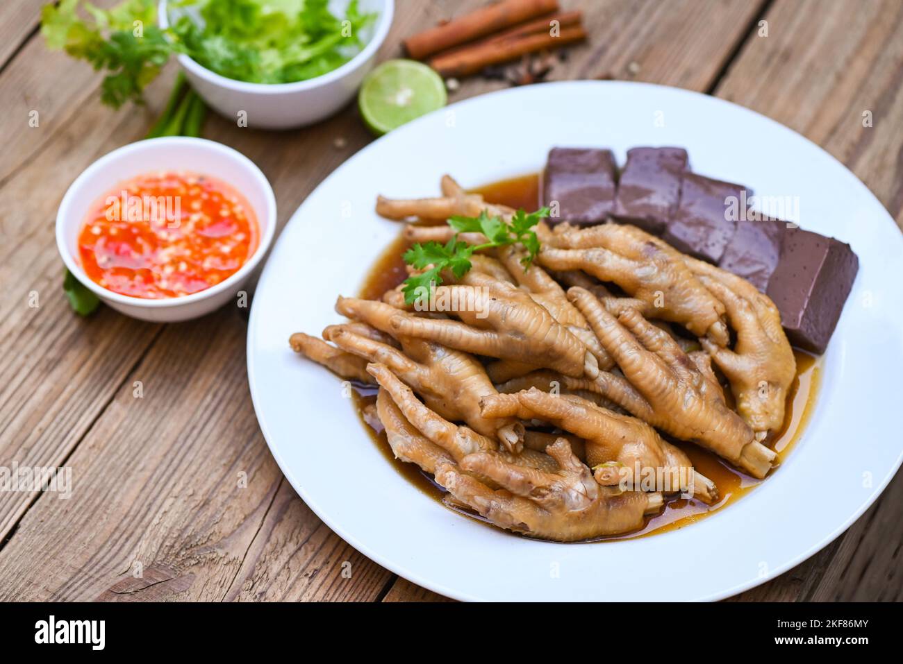 chicken feet soup stewed, cooking chicken feet foot stew on white with ...