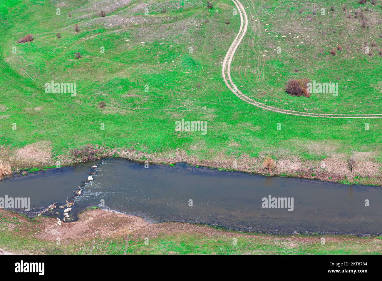 River and green riverside . Landscape with river and green shore ...