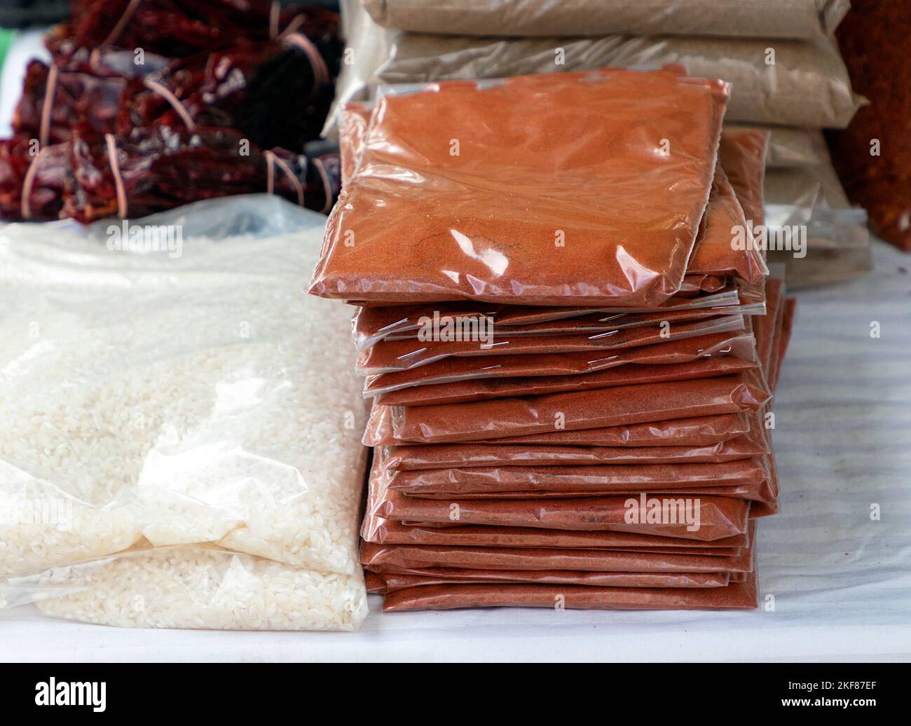 Plastic bags of grind red pepper powder sold on market stall Stock ...