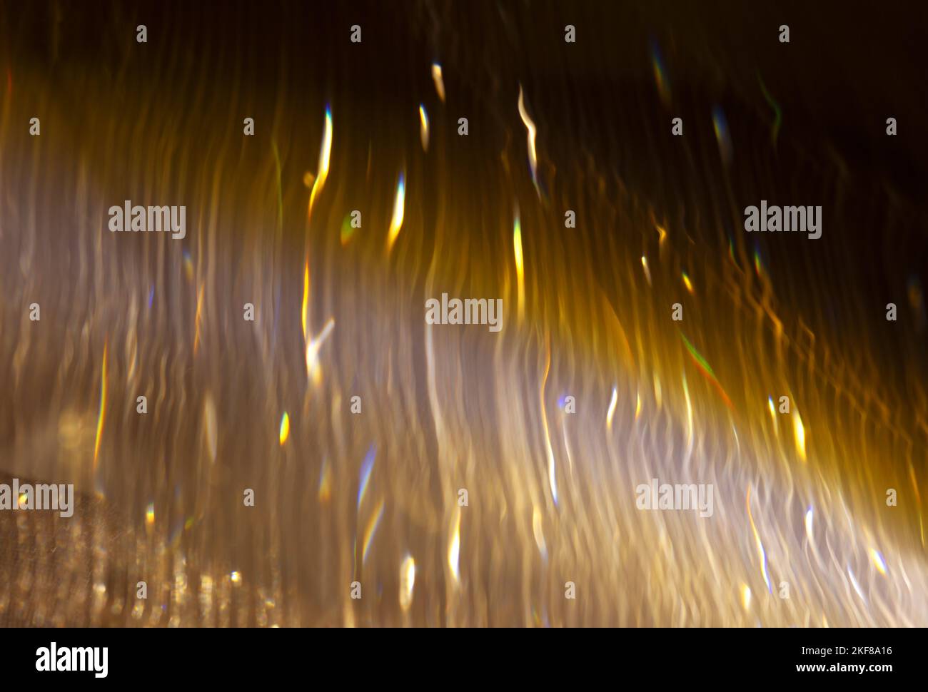 Defocused background of shining glowing lines and spots. The concept of ...
