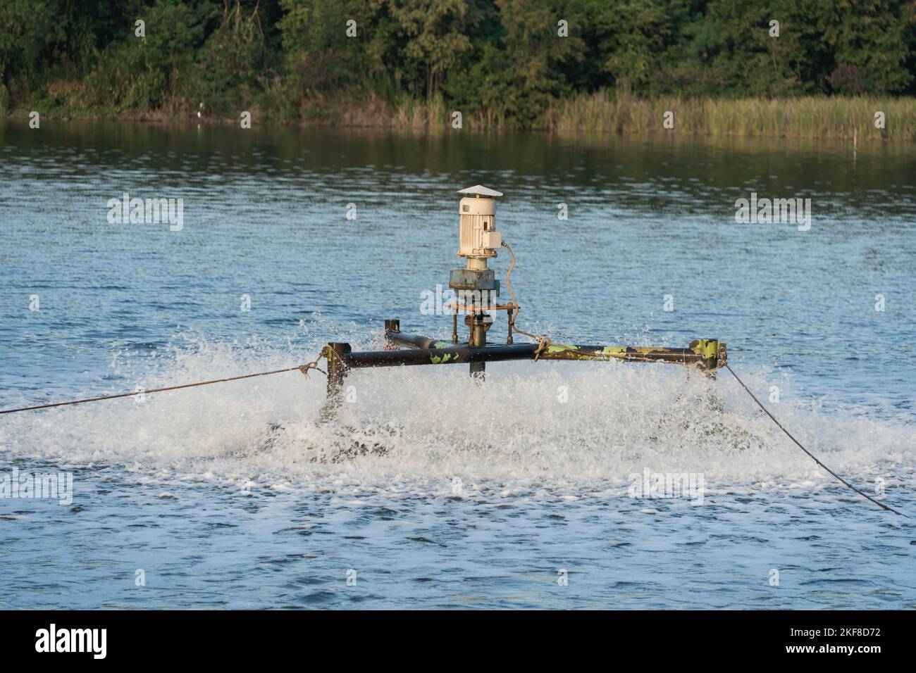 Water treatment concept. Aerator turbine wheel fill oxygen into water ...