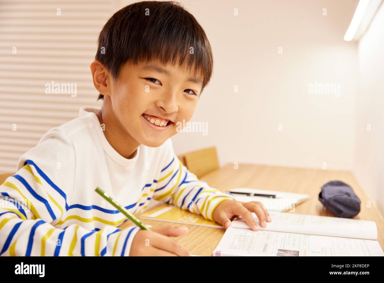 Japanese kid studying at home Stock Photo - Alamy
