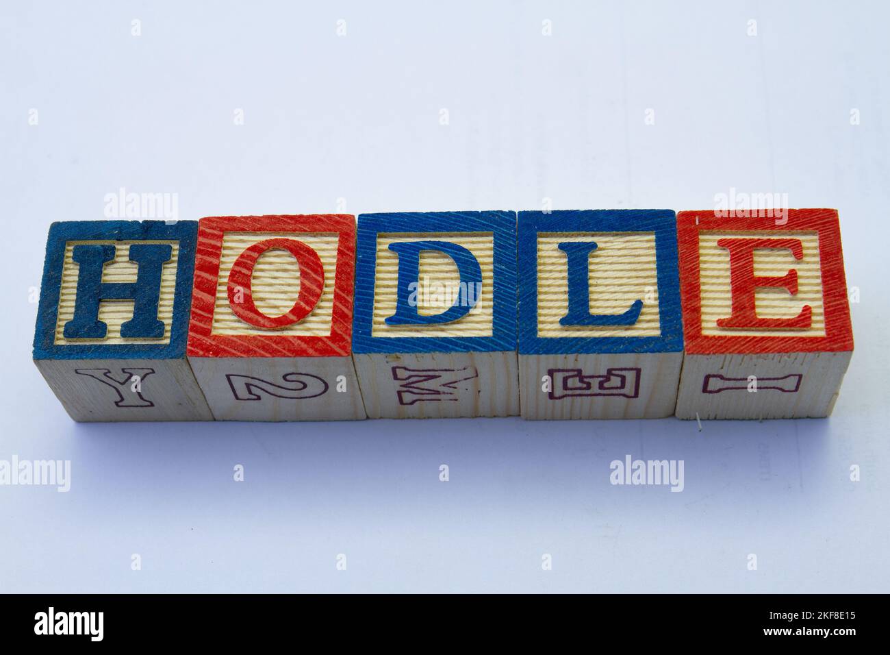 The term hodle visually displayed on a clear background with copy space ...