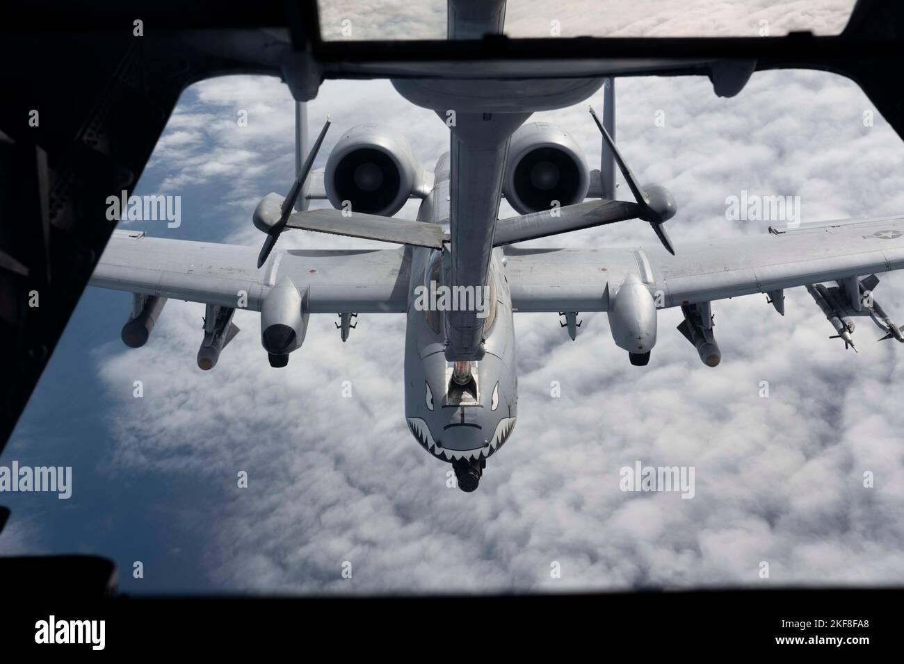 A KC-10 Extender assigned to Travis Air Force Base, California, refuels an A-10C Thunderbolt II ...