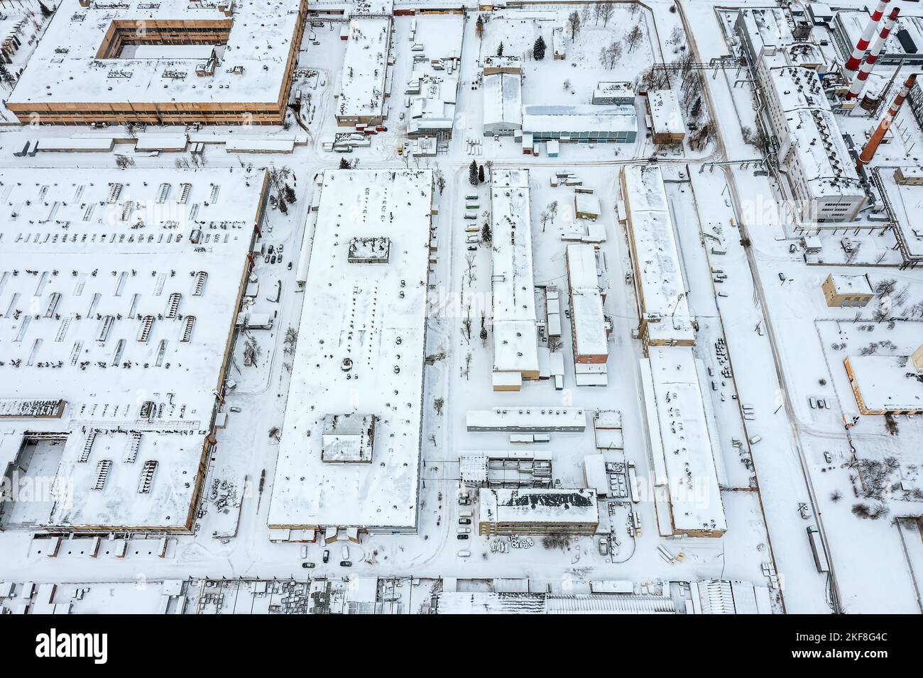 urban industrial area with factory buildings, warehouses and thermal ...