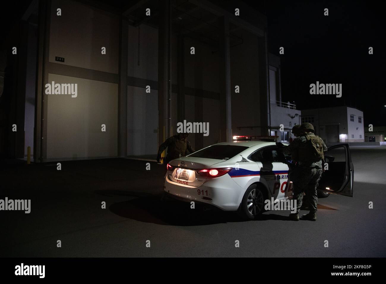 U.S. Marines assigned to the Marine Corps Air Station Iwakuni Provost ...