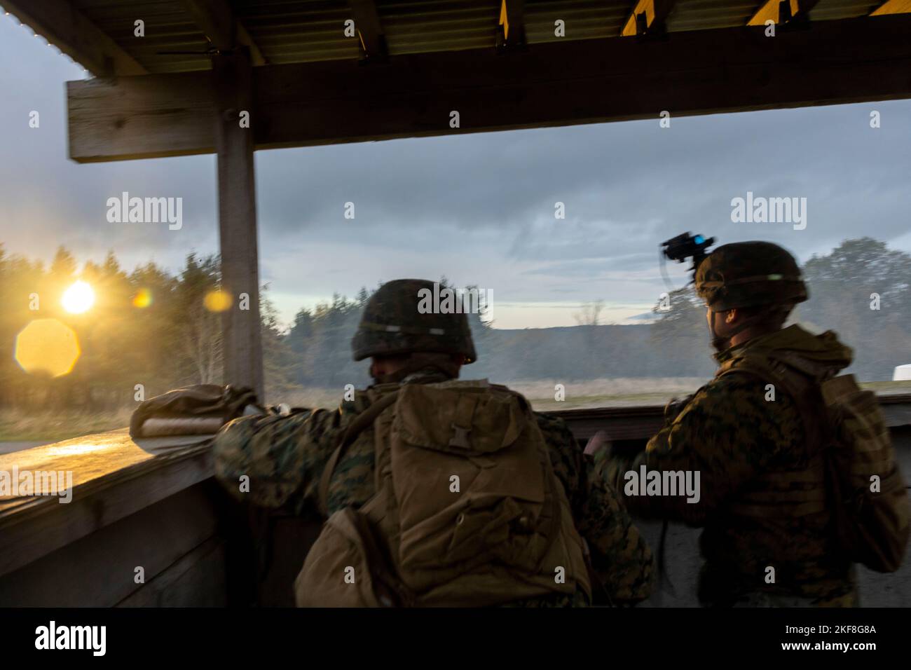 U.S. Marine Corps Sgt. Ethan Holgersen, left, and Jefferey Brosious ...