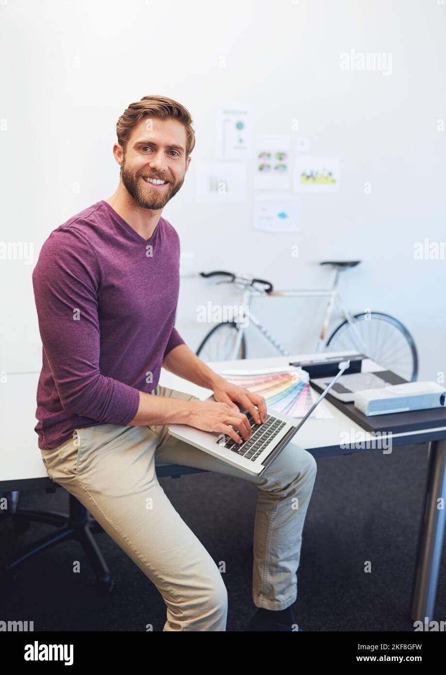 I love my job. Cropped portrait of a young architect working on his ...