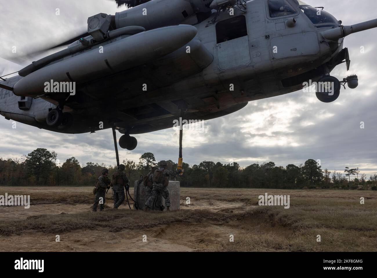 U.S. Marines with Combat Logistics Battalion (CLB) 22 attach a HIMARS ...