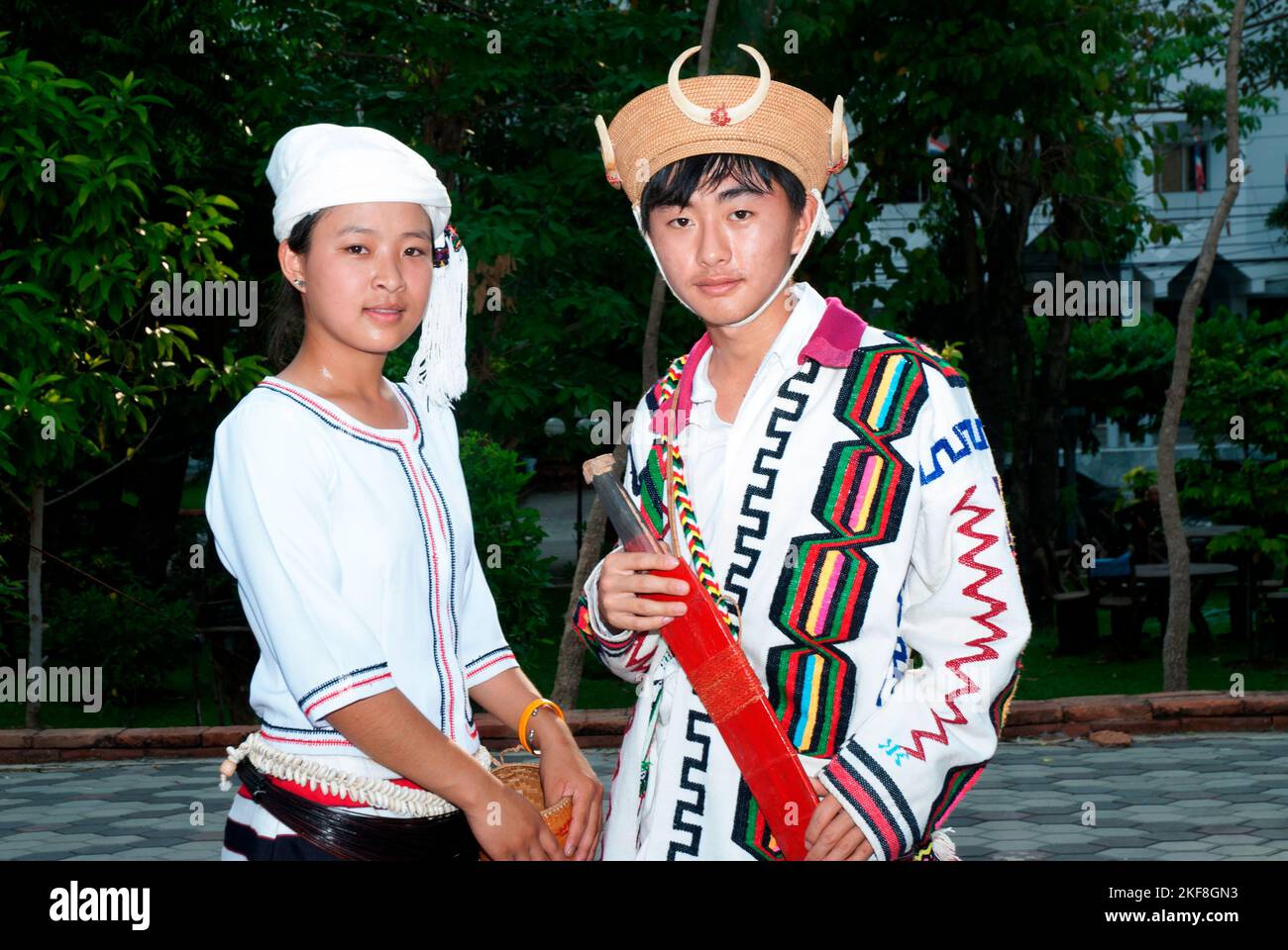 Ethnic Kachin male in traditional attire wear traditional rattan hats ...