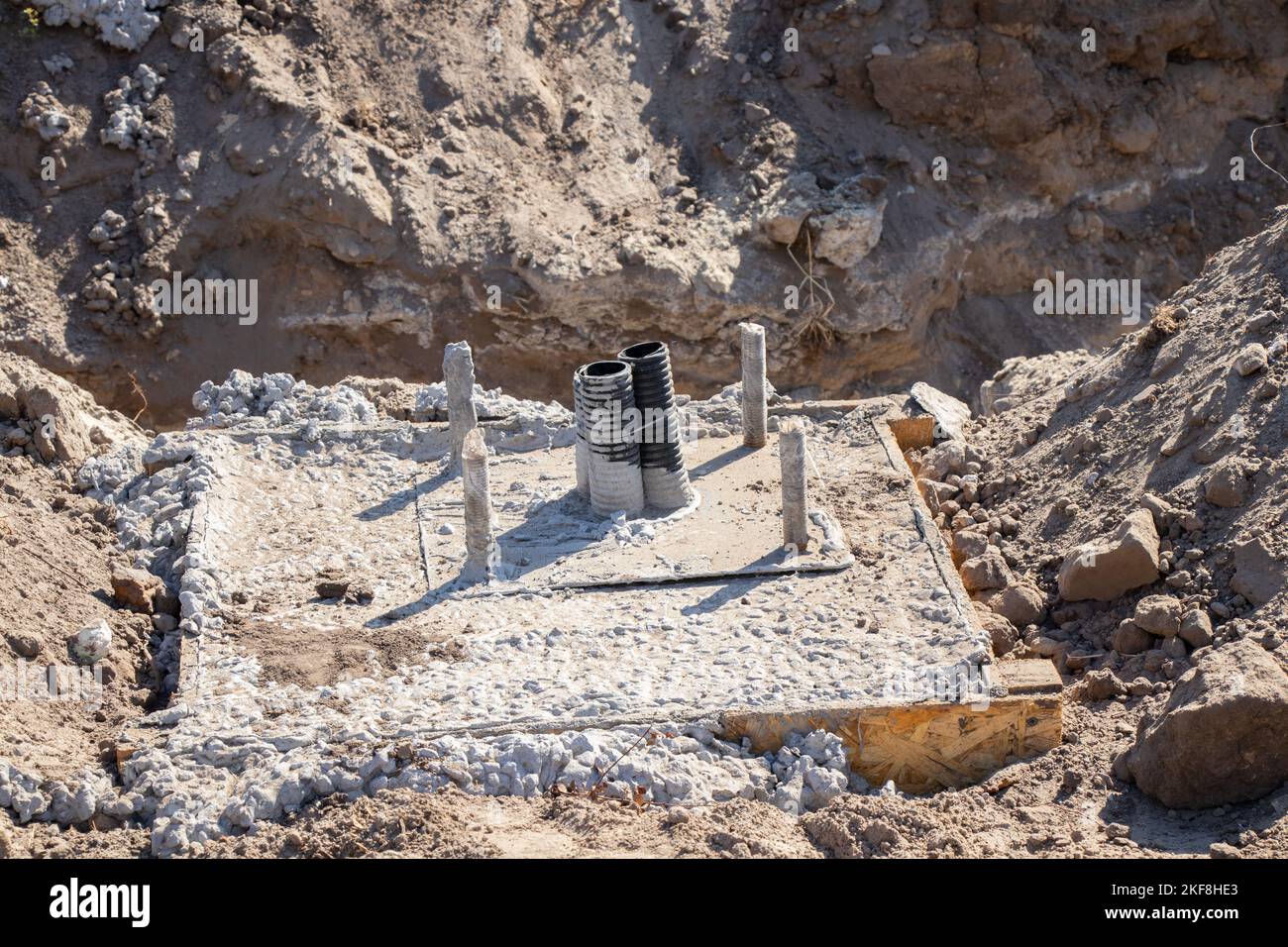 pour concrete foundation with cable under the pillar dries Stock Photo ...
