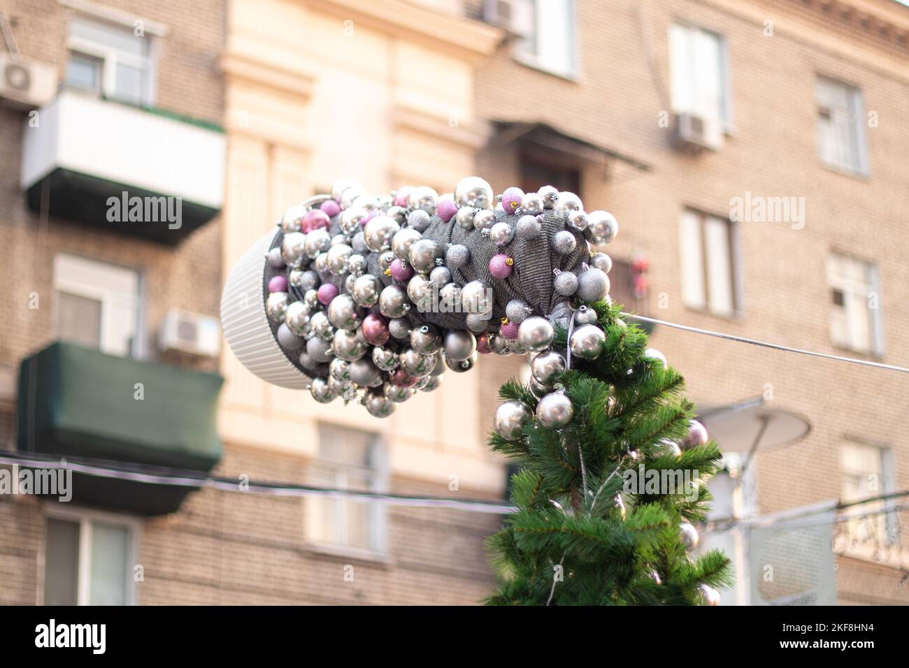 Christmas tree on the street as a background Stock Photo - Alamy