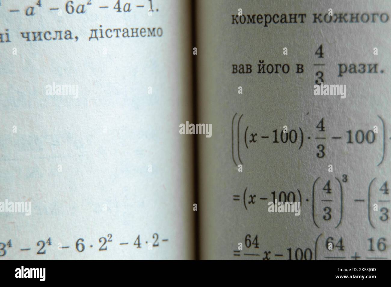 algebra equation on old book page as background, algebra homework Stock ...