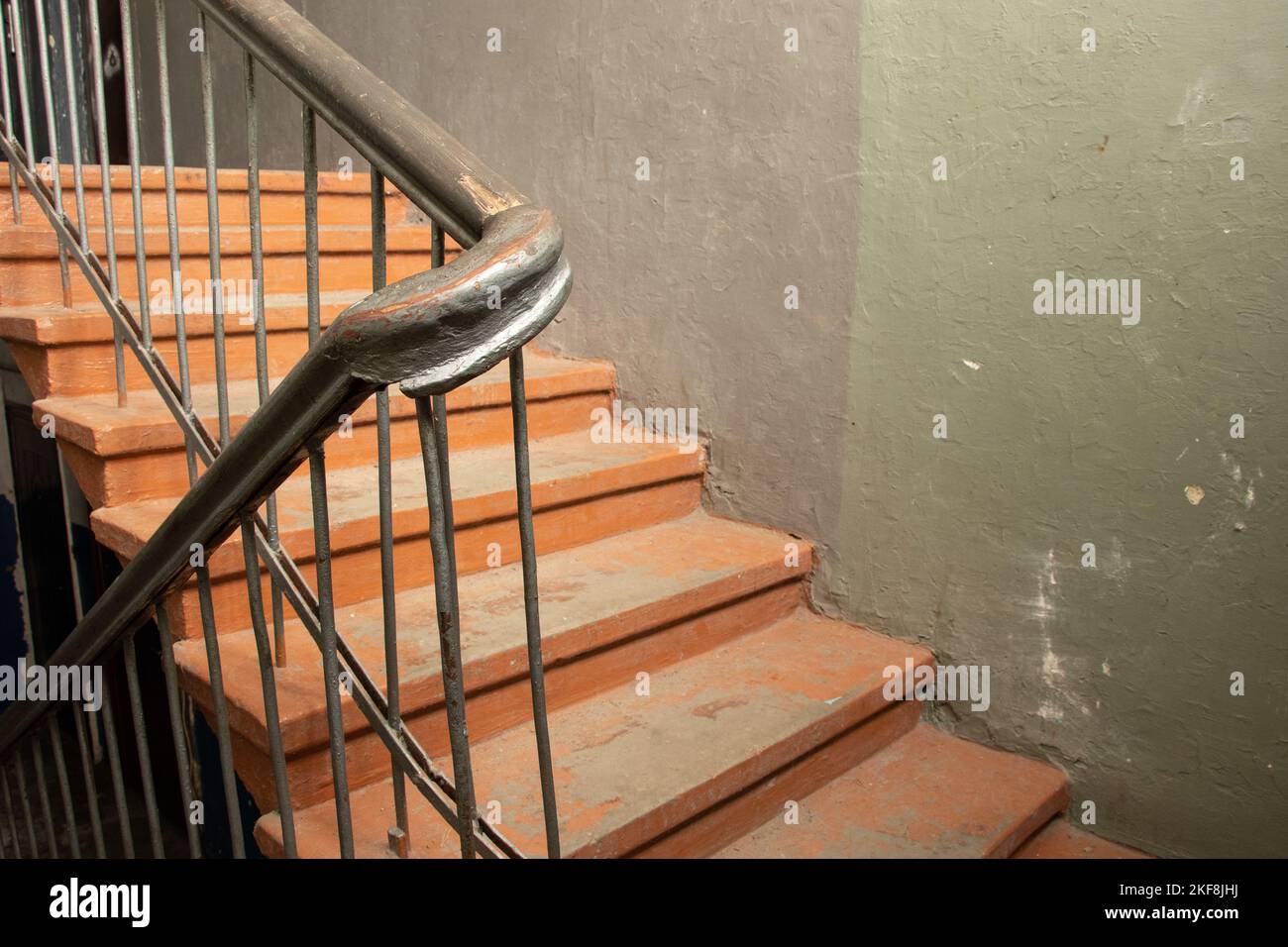 old soviet dirty dark staircase at the entrance of an apartment ...