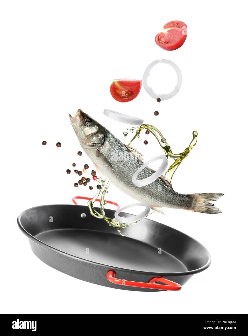 Flying fresh fish with splashes of oil, spices and frying pan on white ...