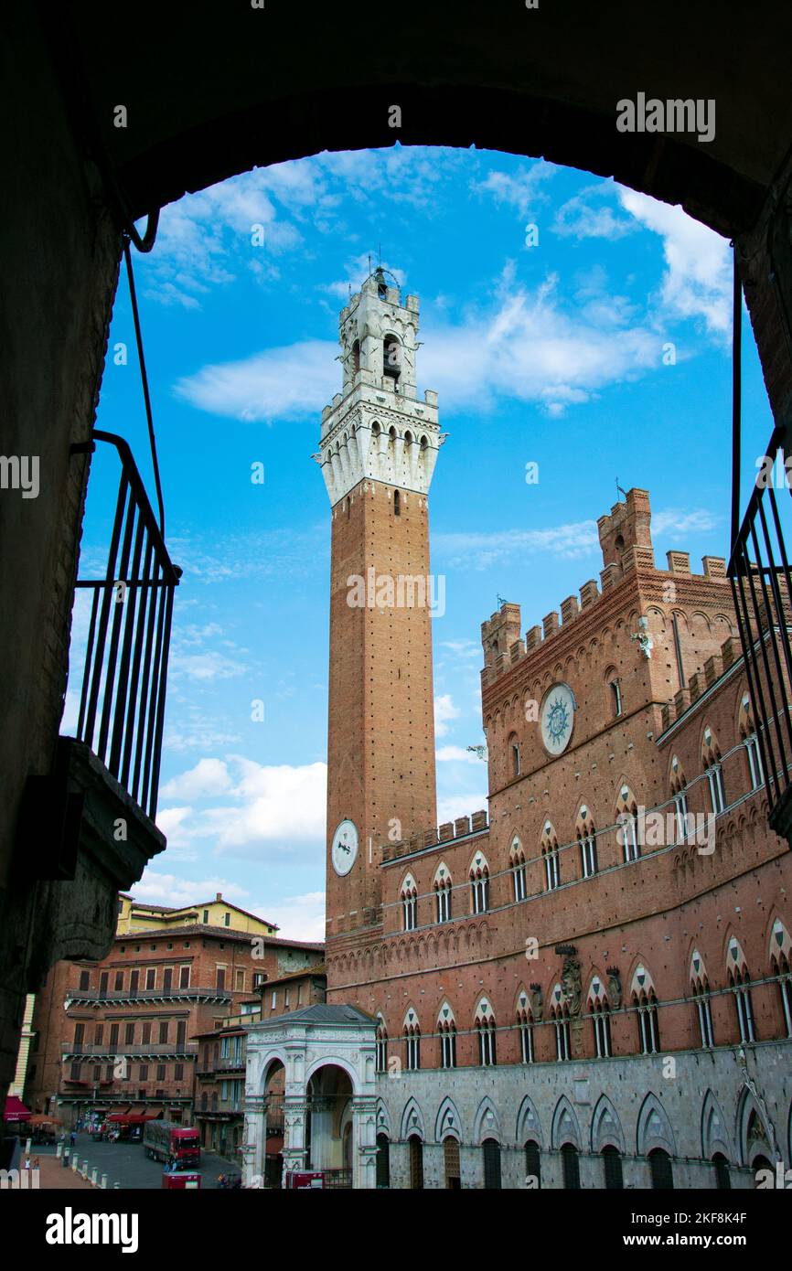 The Palazzo Pubblico Tower of Mangia, Siena from a back alley of the ...