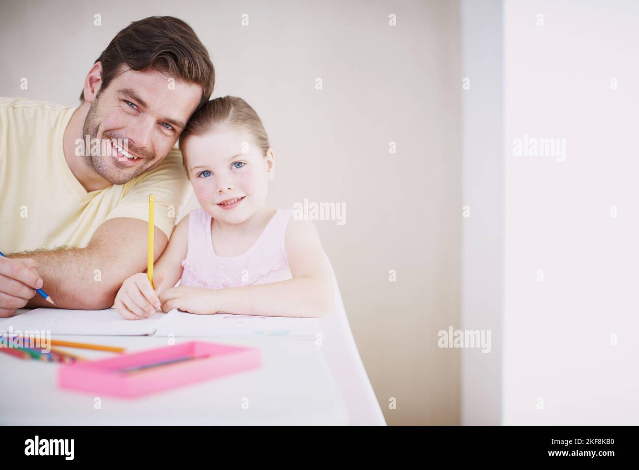 She always does her homework. a little girl doing her homework Stock ...