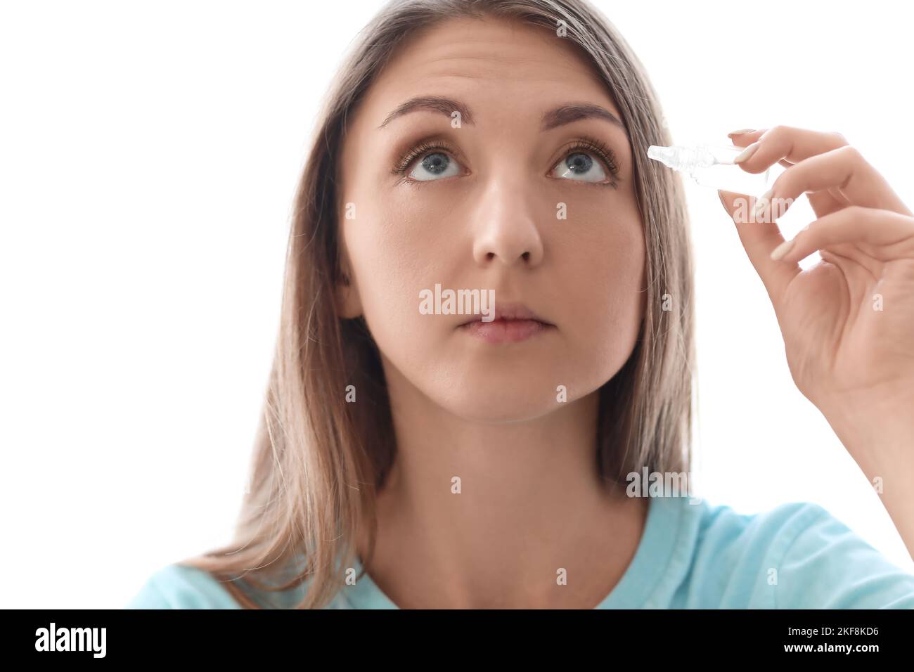 Beautiful woman using eye drops at home, closeup Stock Photo - Alamy