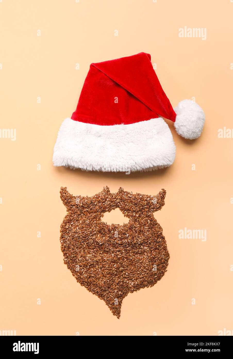 Santa hat with beard made of grains on beige background Stock Photo - Alamy